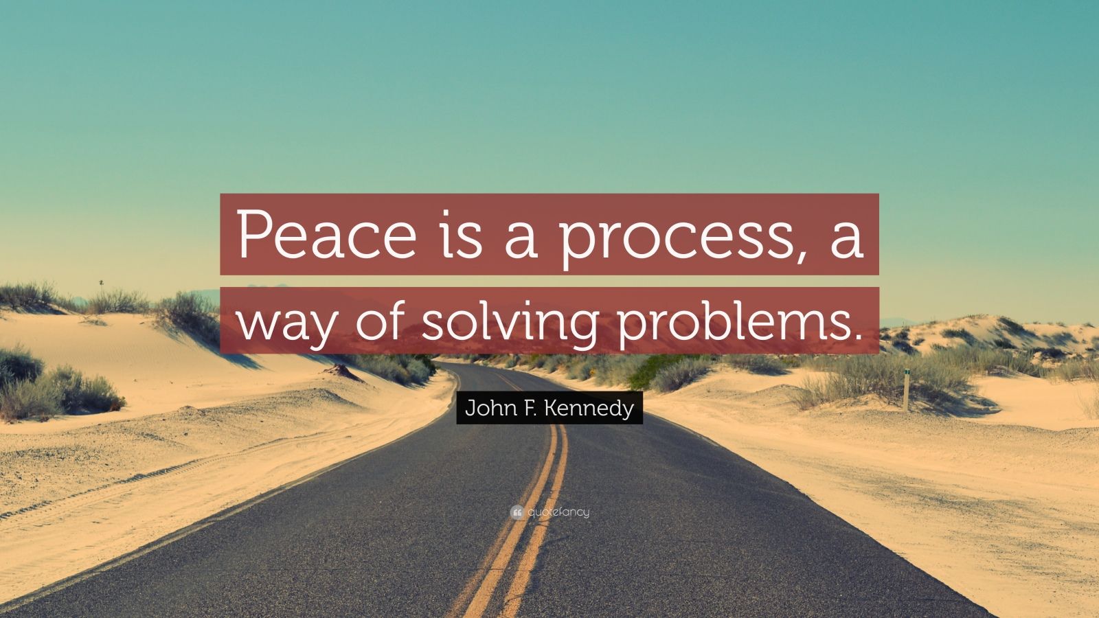 John F. Kennedy Quote: “Peace is a process, a way of solving problems.”