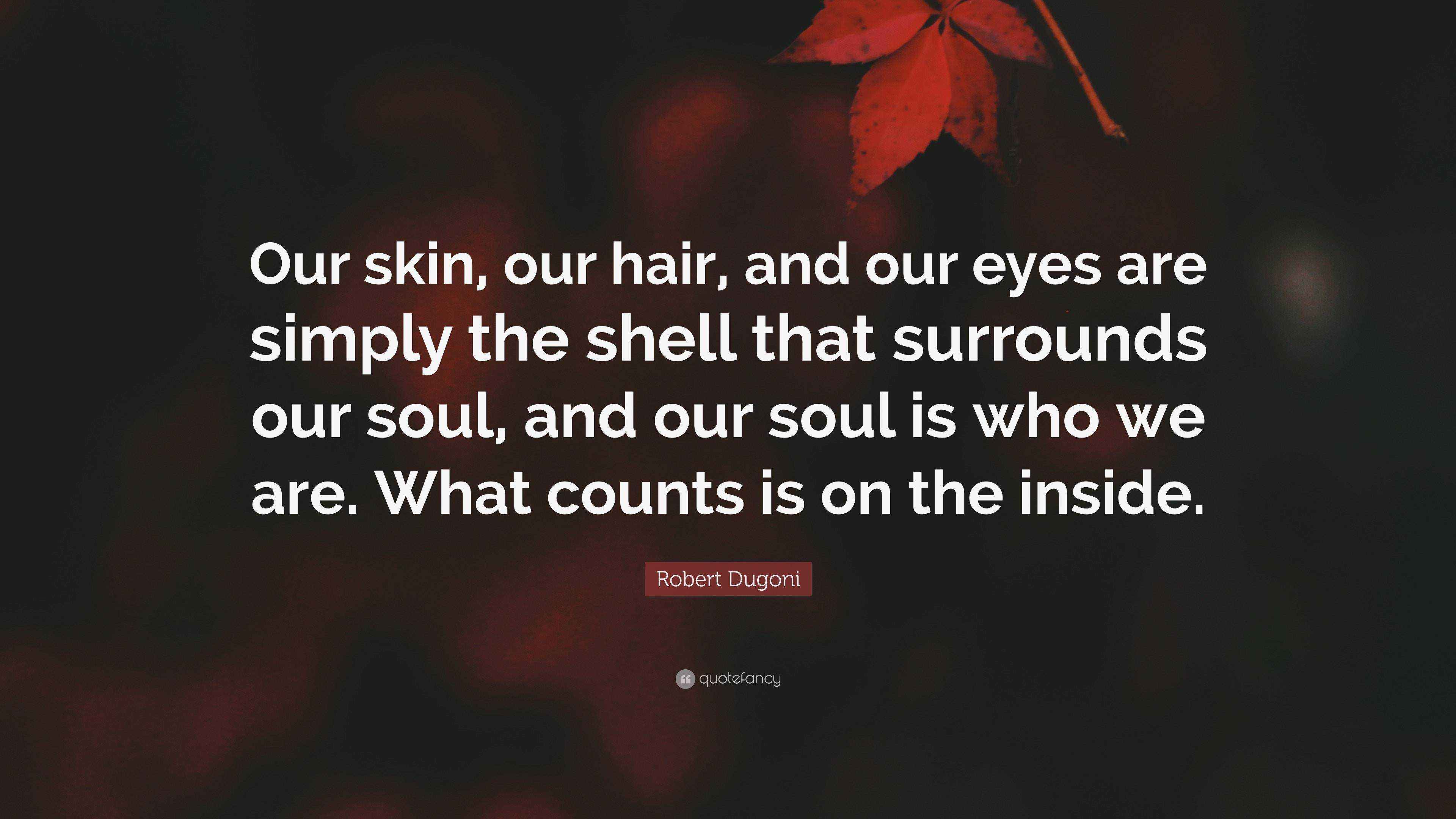 Robert Dugoni Quote: “Our skin, our hair, and our eyes are simply the ...