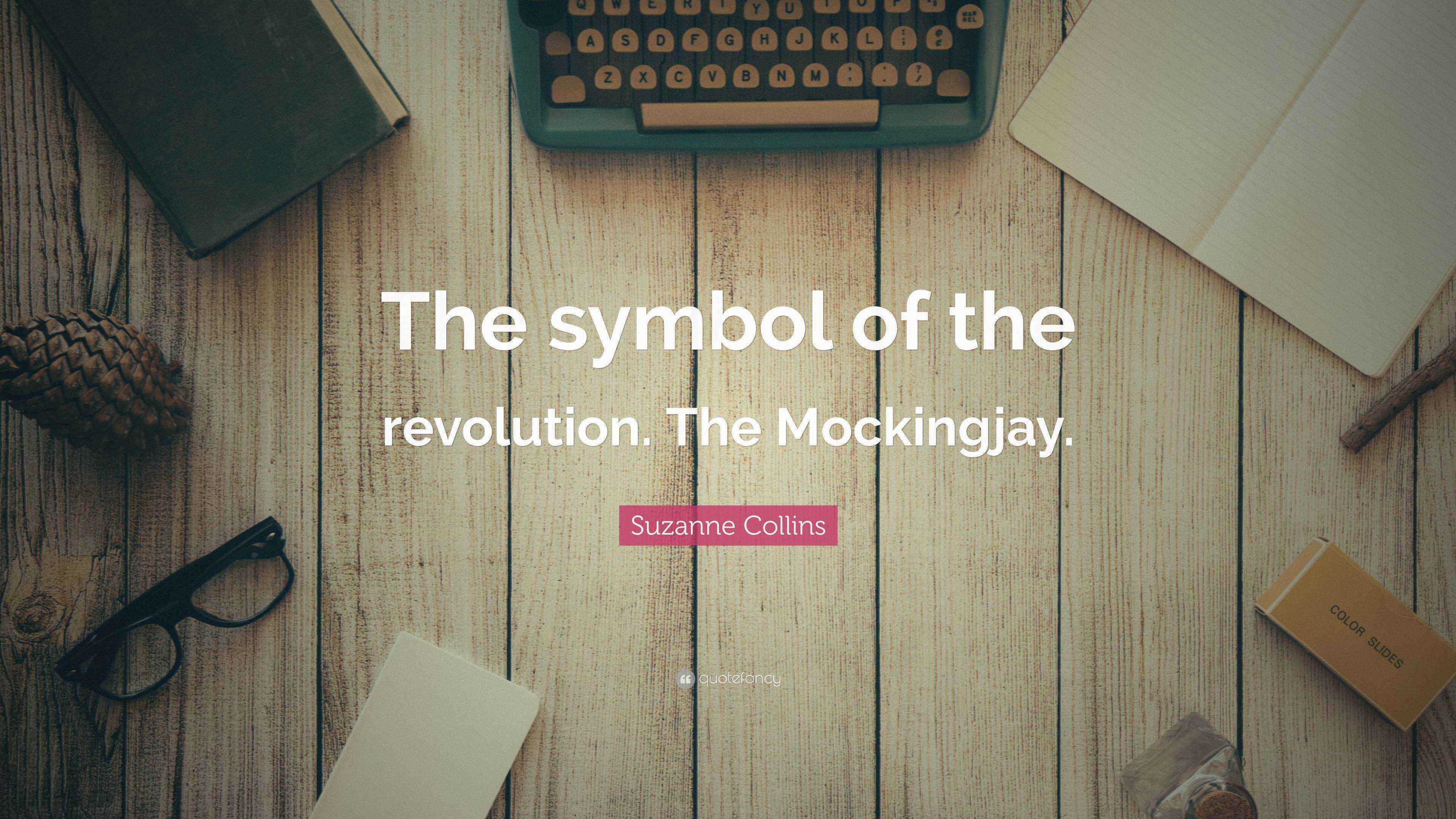Suzanne Collins Quote: “The symbol of the revolution. The Mockingjay.”