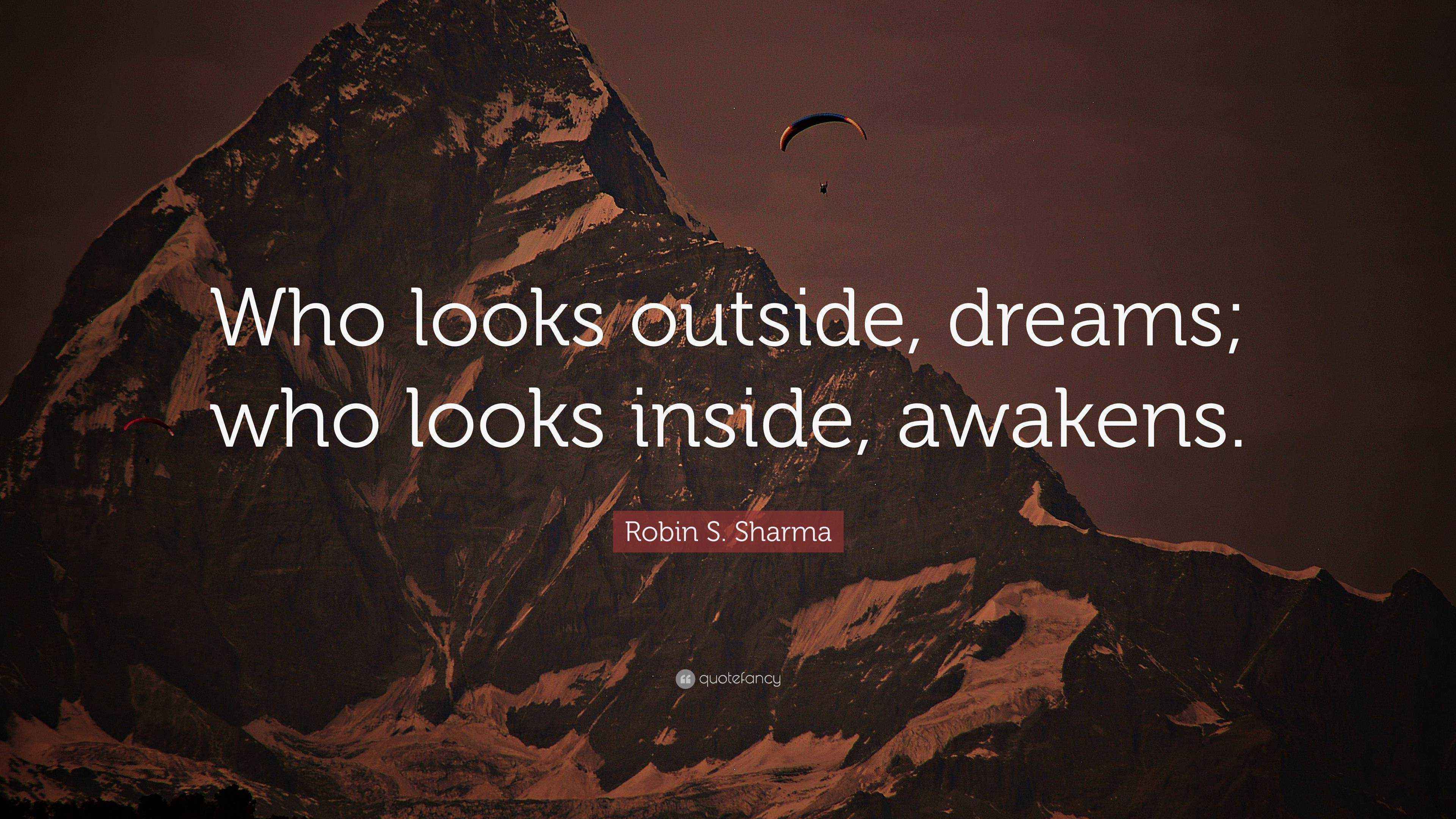 Robin S. Sharma Quote: “Who looks outside, dreams; who looks inside ...