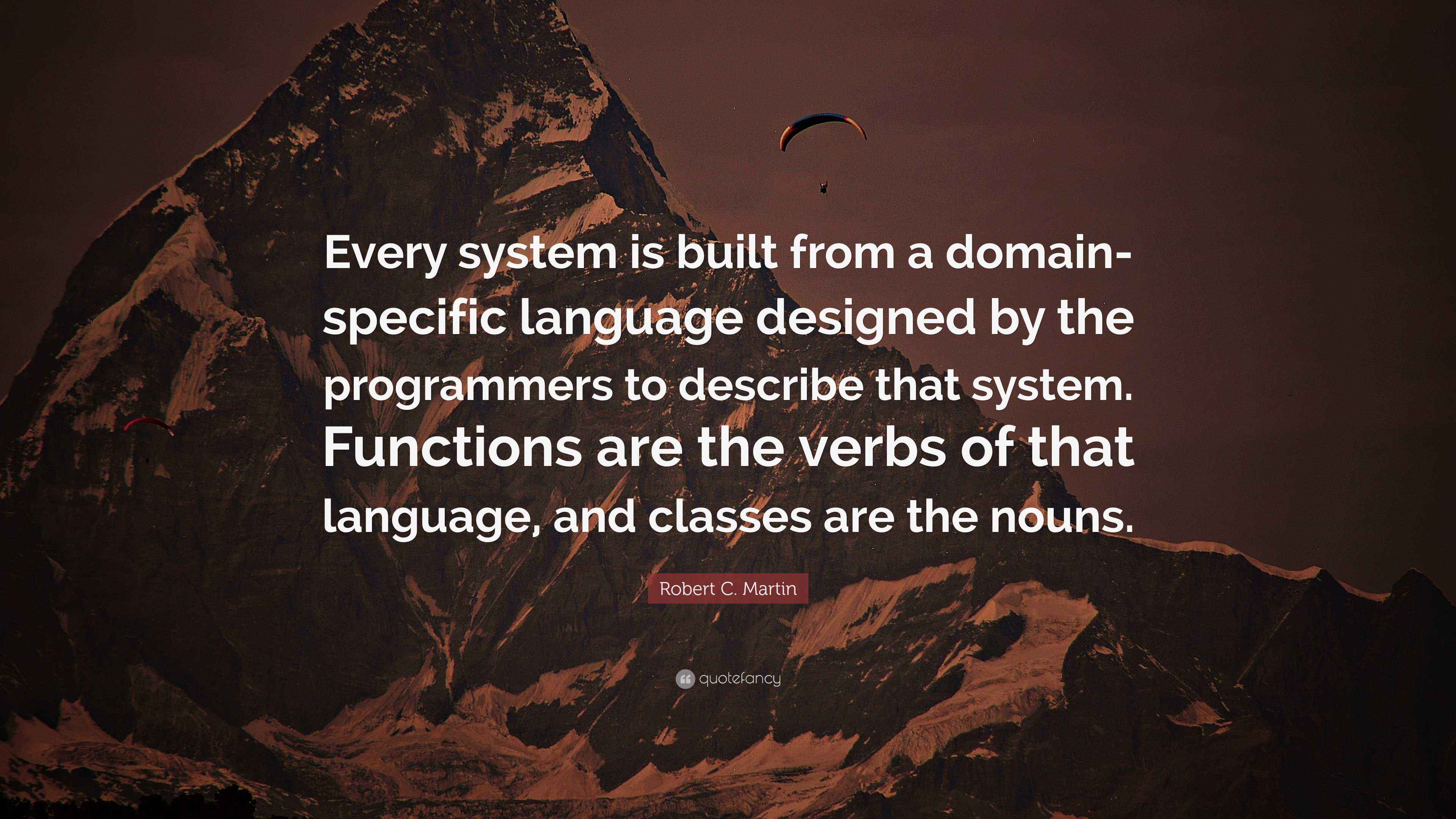 Robert C. Martin Quote: “Every system is built from a domain-specific ...