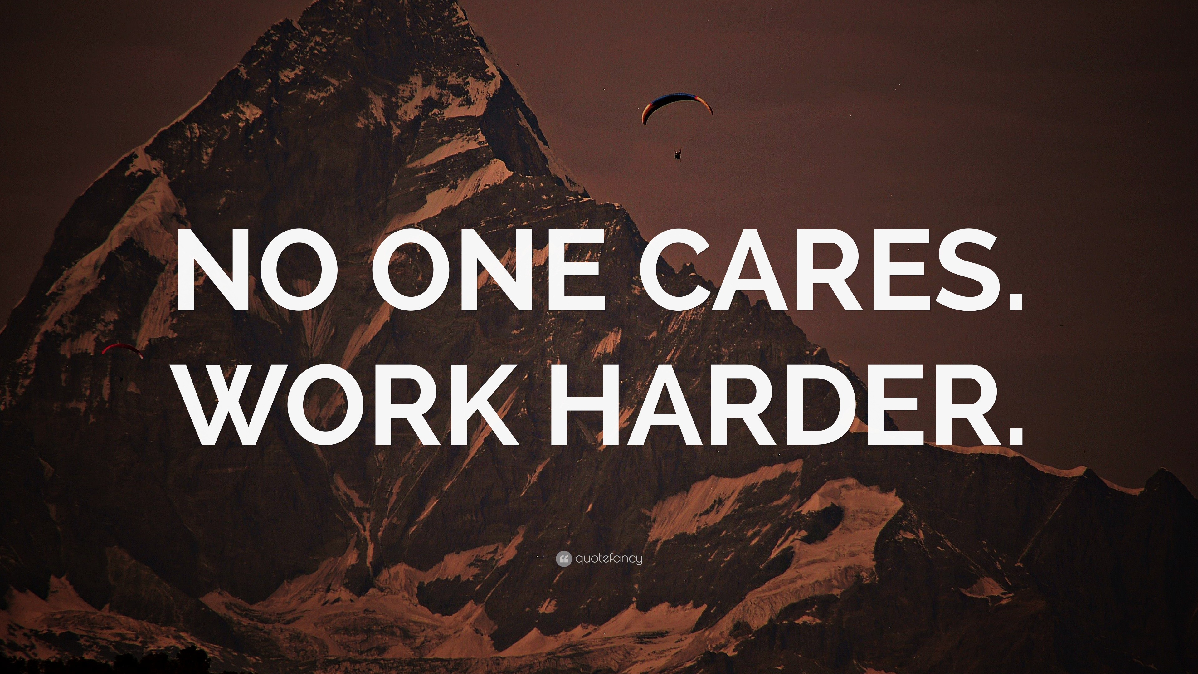 “NO ONE CARES. WORK HARDER.” Wallpaper by QuoteFancy