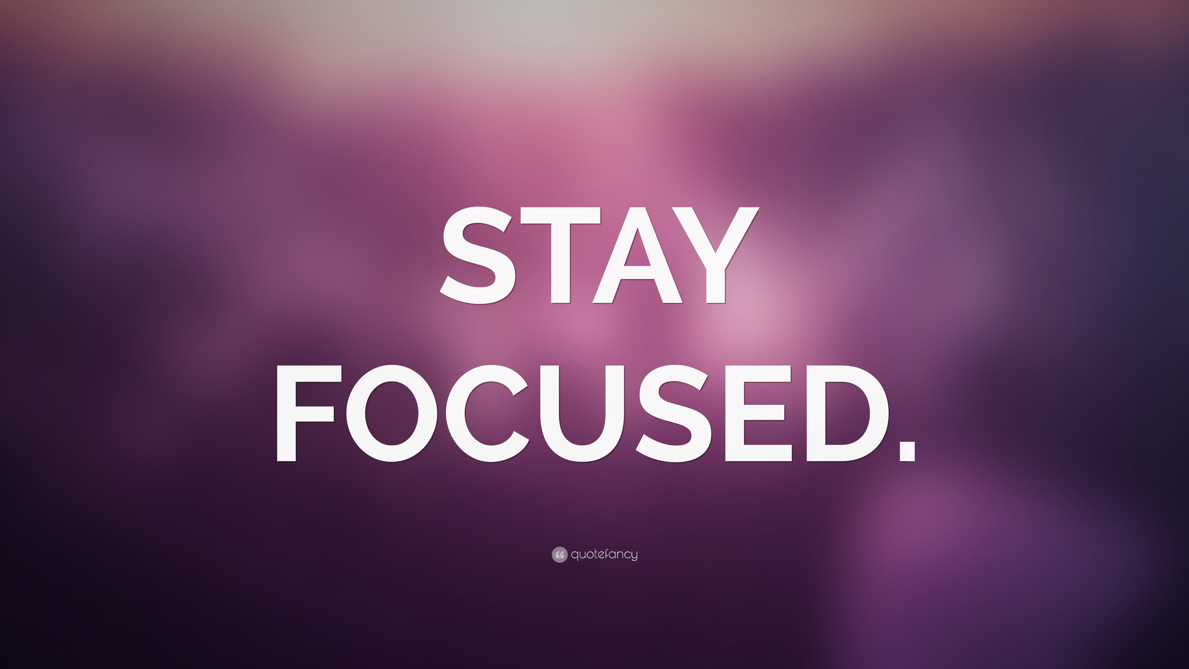 “STAY FOCUSED.” Wallpaper by QuoteFancy
