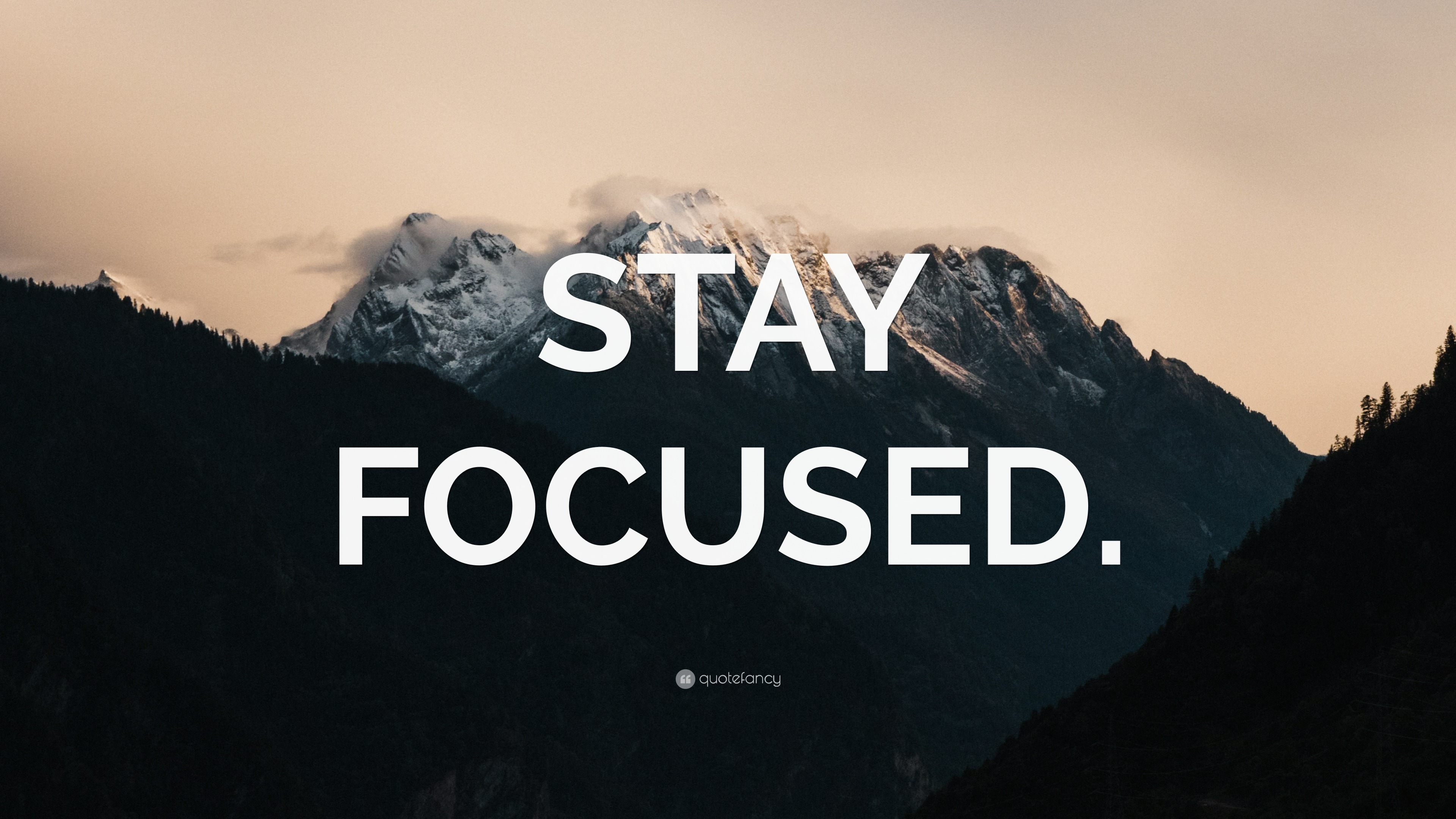 “STAY FOCUSED.” Wallpaper by QuoteFancy