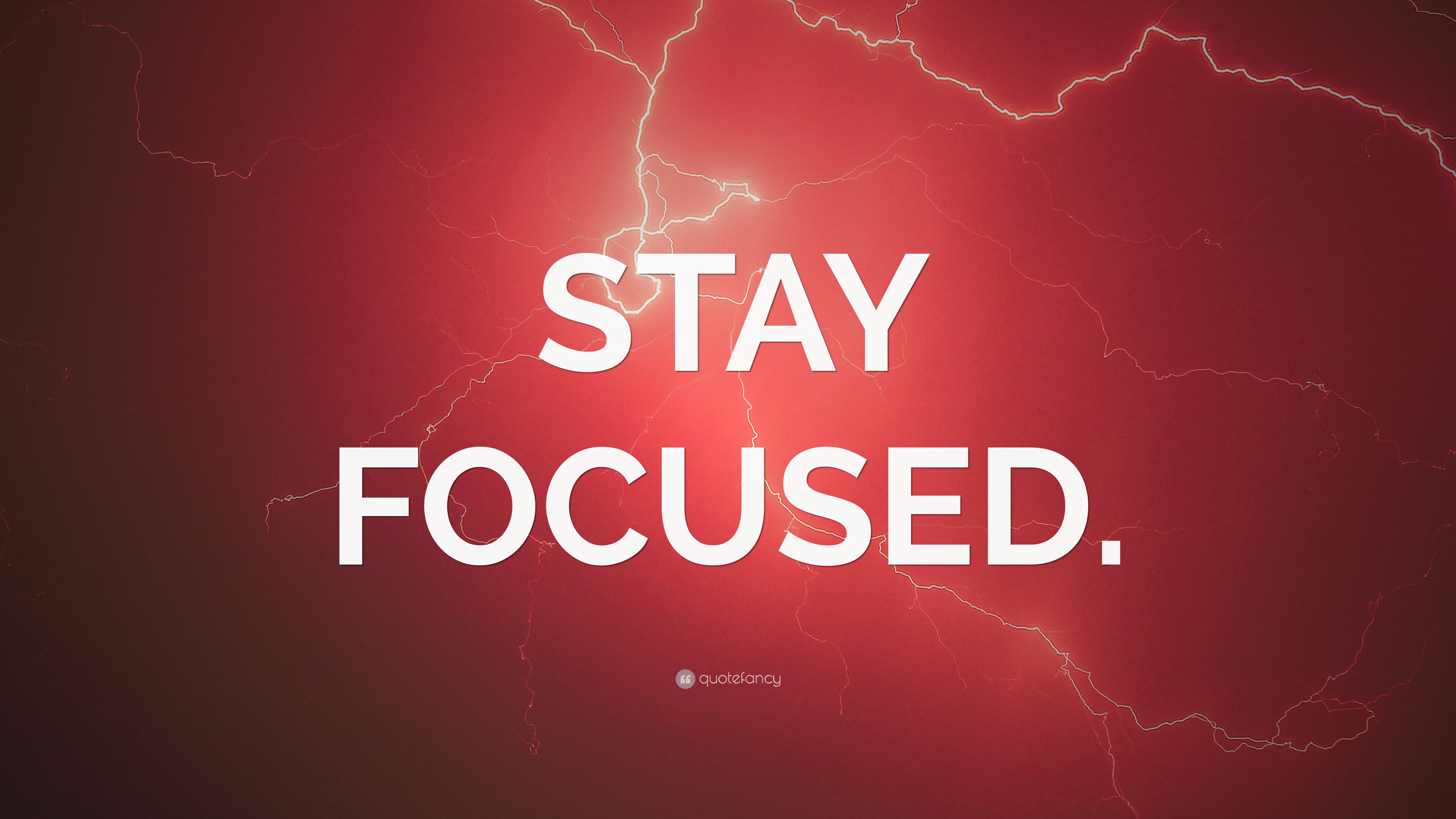 “STAY FOCUSED.” Wallpaper by QuoteFancy