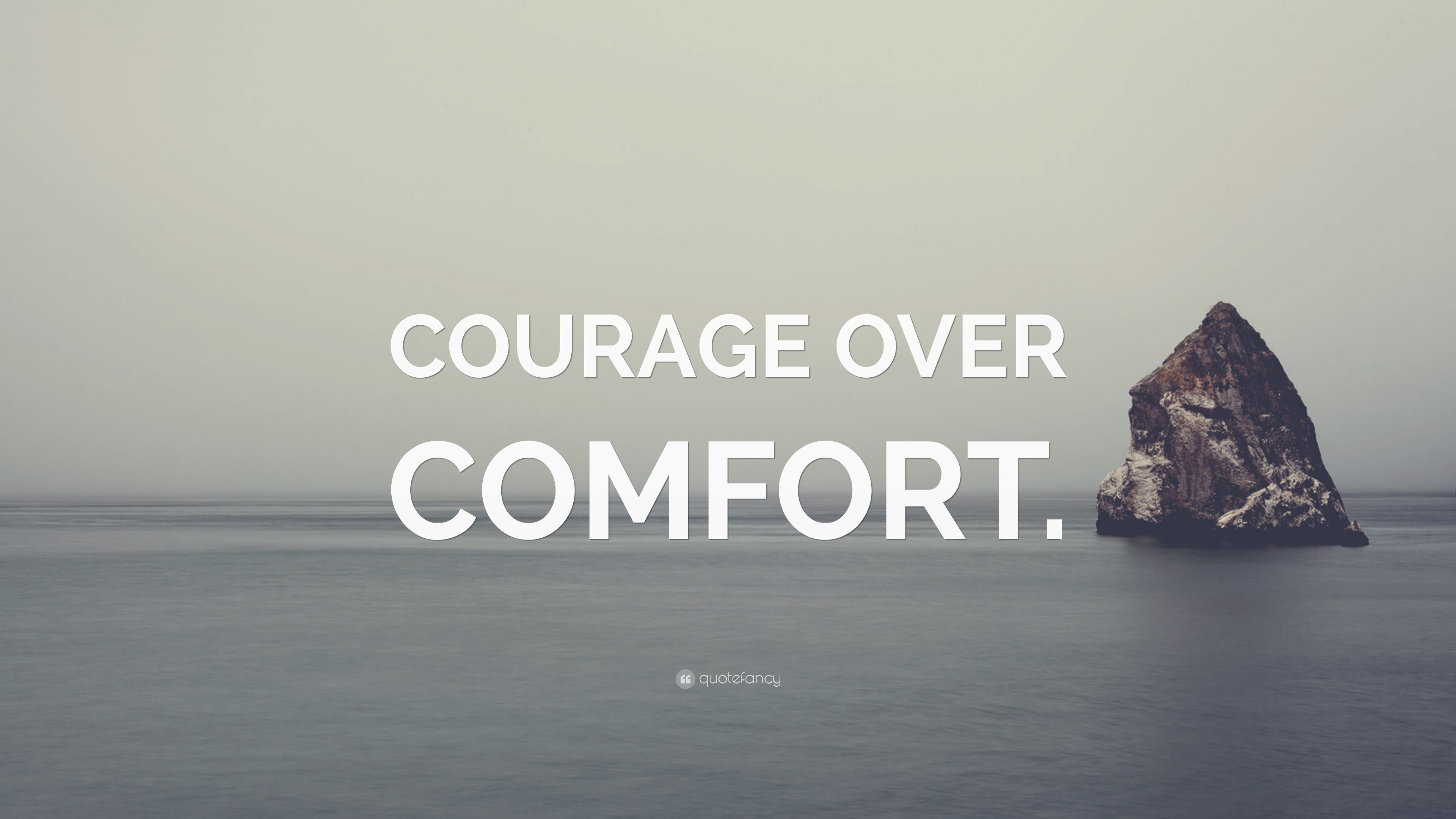 “COURAGE OVER COMFORT.” Wallpaper by QuoteFancy