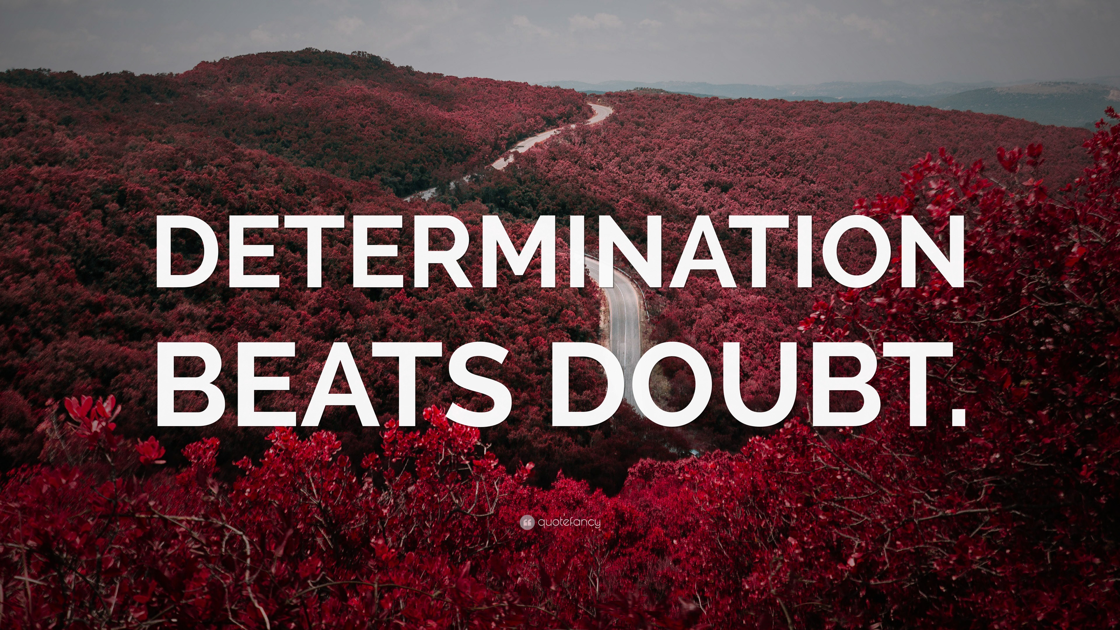 “DETERMINATION BEATS DOUBT.” Wallpaper by QuoteFancy