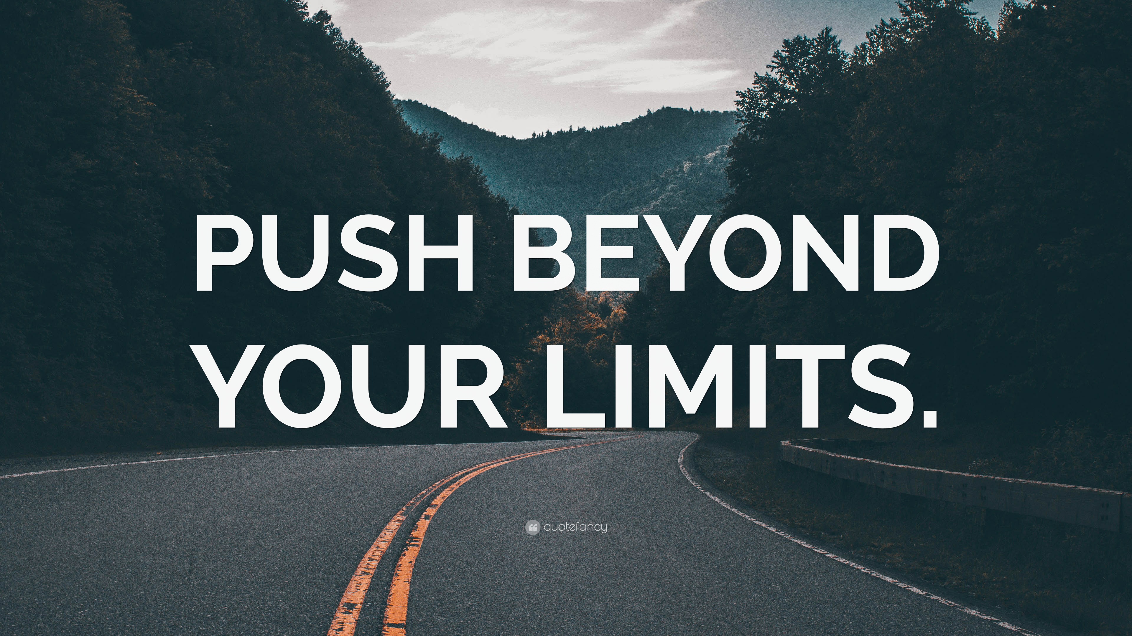 “PUSH BEYOND YOUR LIMITS.” Wallpaper by QuoteFancy
