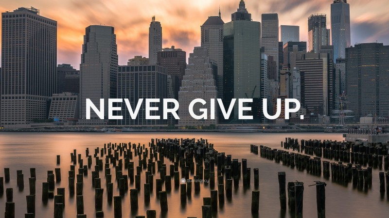 “NEVER GIVE UP.” Wallpaper by QuoteFancy